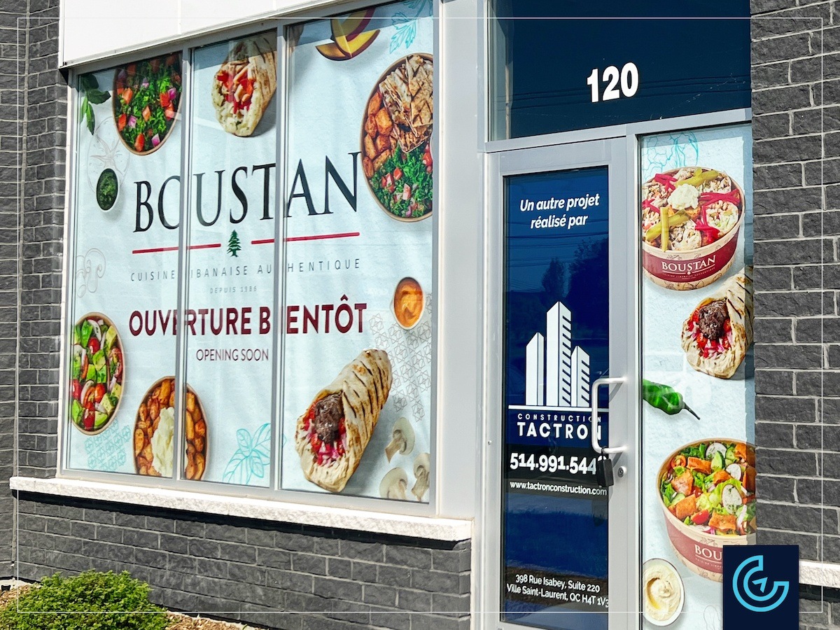 Temporary window graphics "Opening Soon" as construction palisade for ...