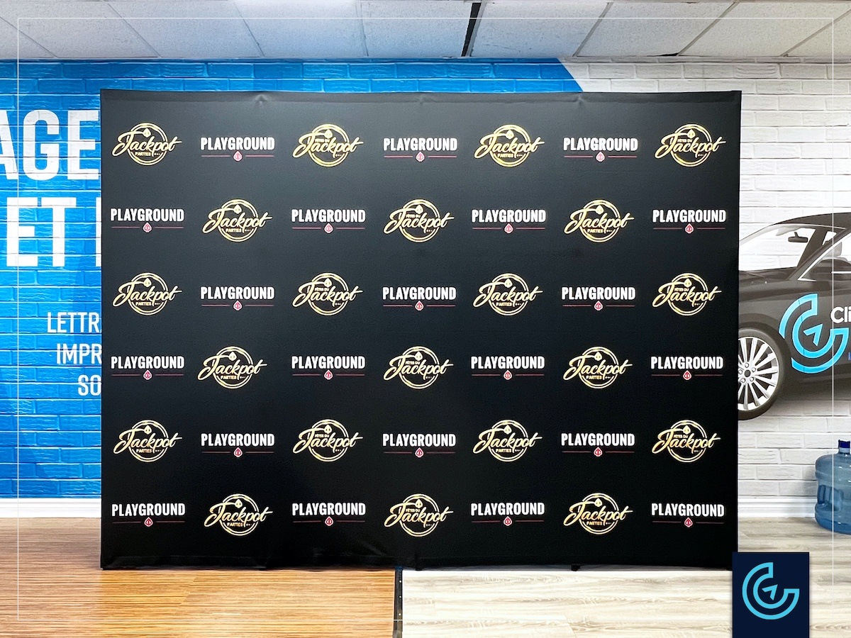 Display backwall printing for an event: Playground - Click Affiche Inc.