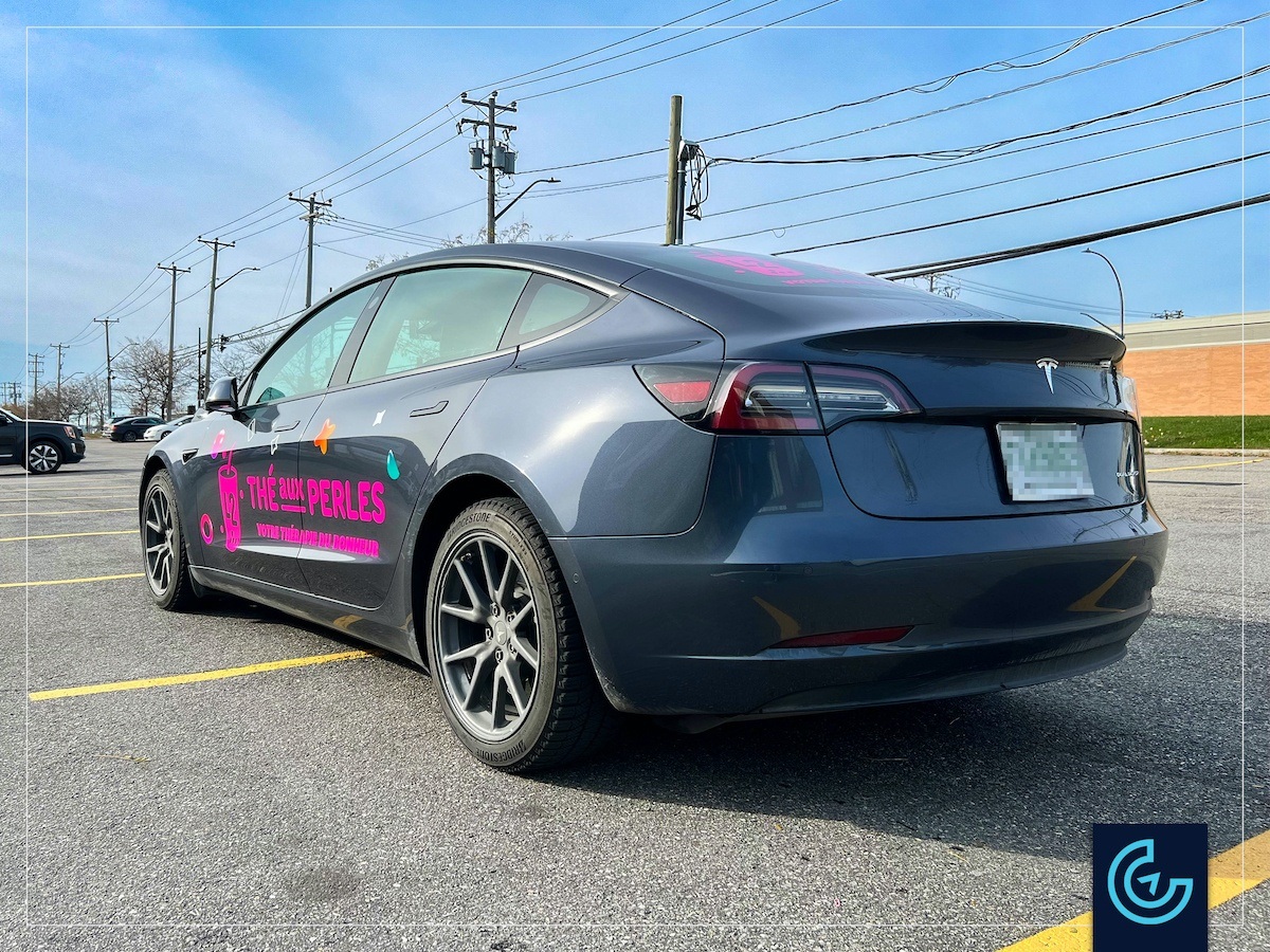 Vehicle lettering on a sedan 2023 Tesla 3 for the bubble tea franchise ...