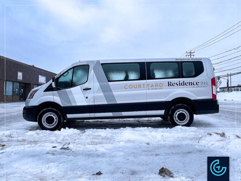 Branding shuttle van lettering on a 2023 Ford Transit Passenger Low ...