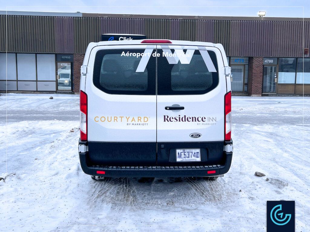 Branding shuttle van lettering on a 2023 Ford Transit Passenger Low ...