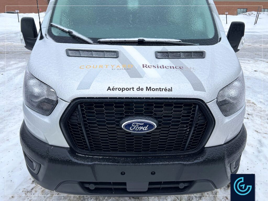 Branding shuttle van lettering on a 2023 Ford Transit Passenger Low ...